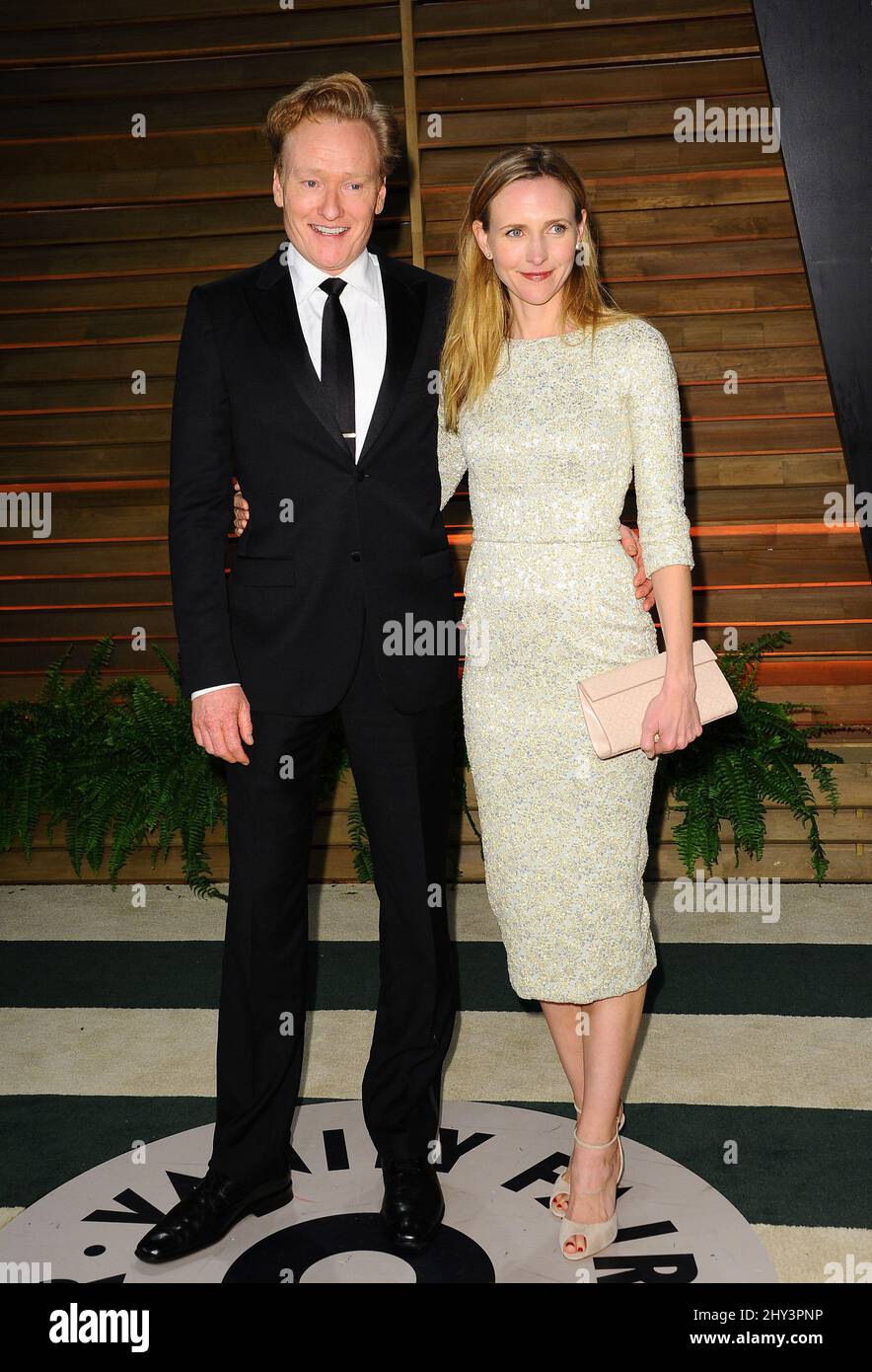 Conan O'Brien and Liza Powel arrives for the 2014 Vanity Fair Oscar ...