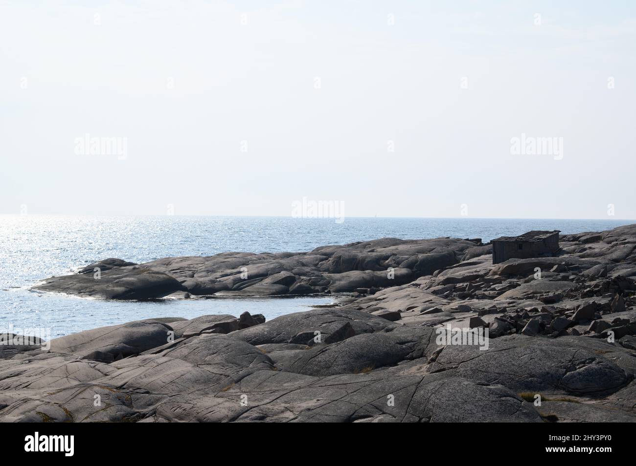 Remote island in Sweden with a destroyed hut at the sea Stock Photo - Alamy