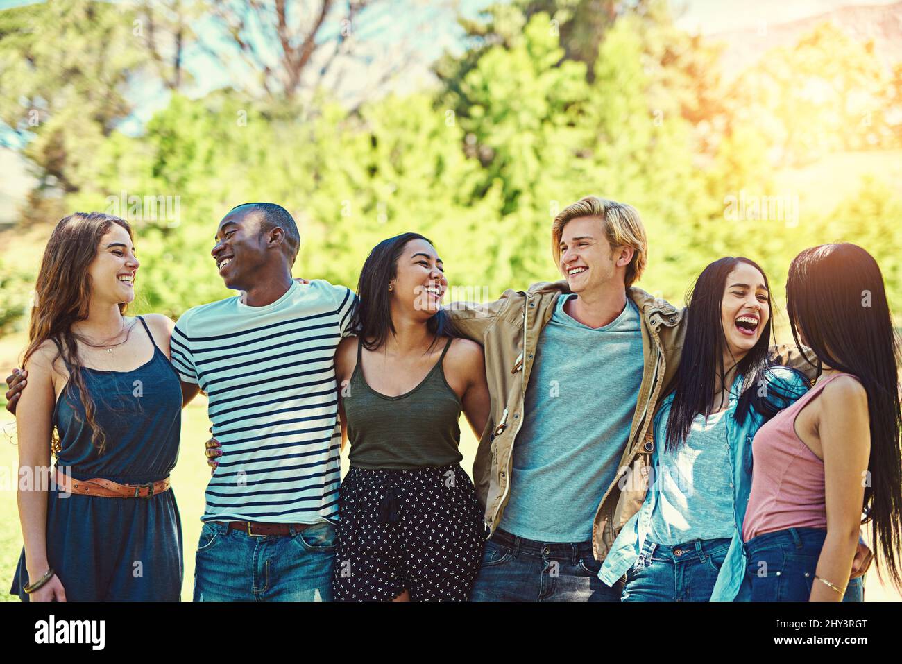 Best times with the best of friends. Cropped shot of a group of young ...