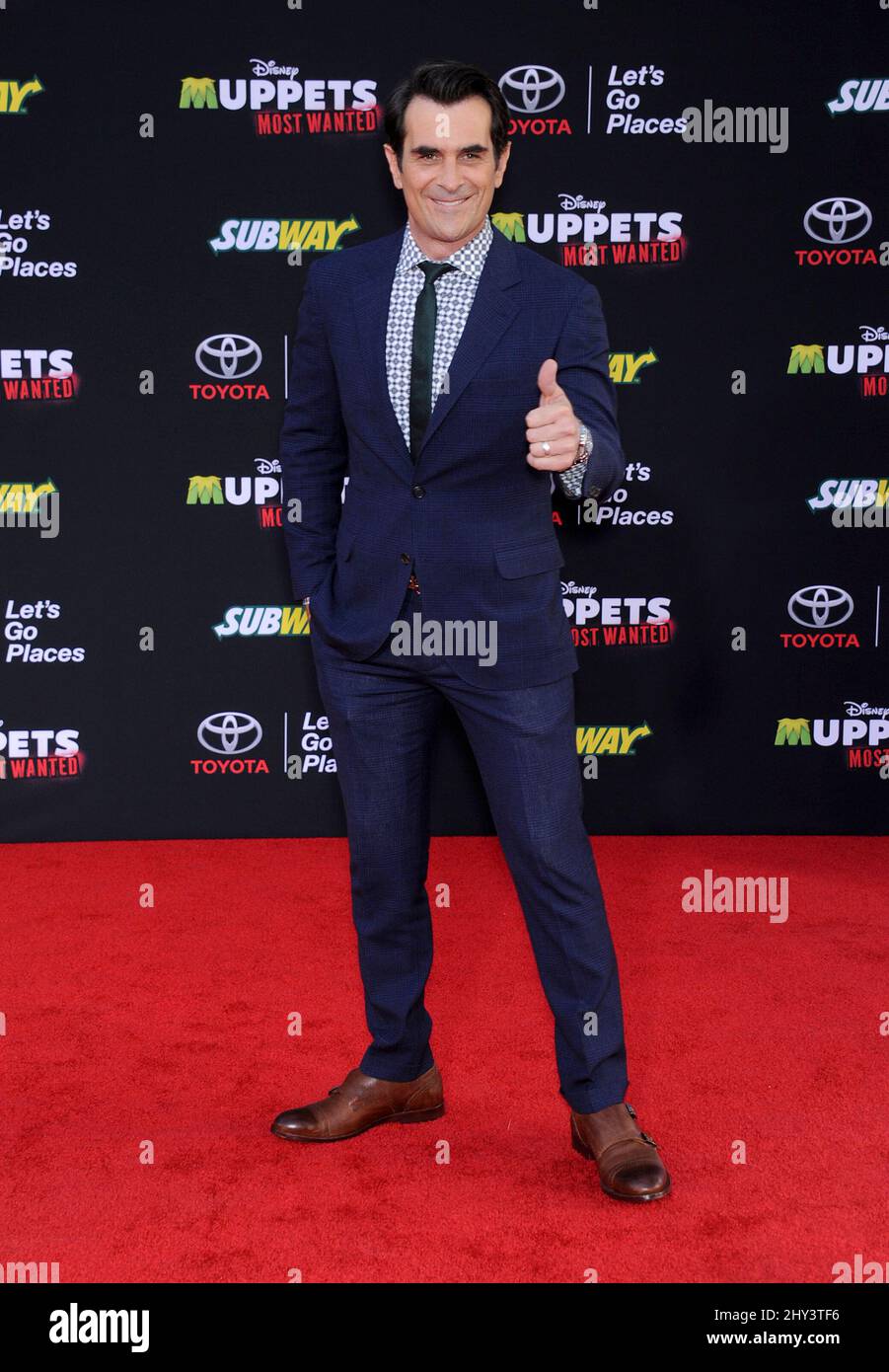 Ty Burrell attending the Muppets Most Wanted Los Angeles Premiere at ...