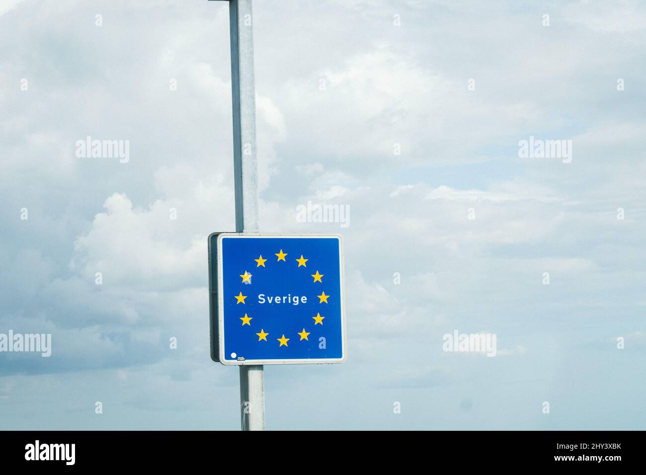 Sign post with the European Union flag and inscription, translation ...