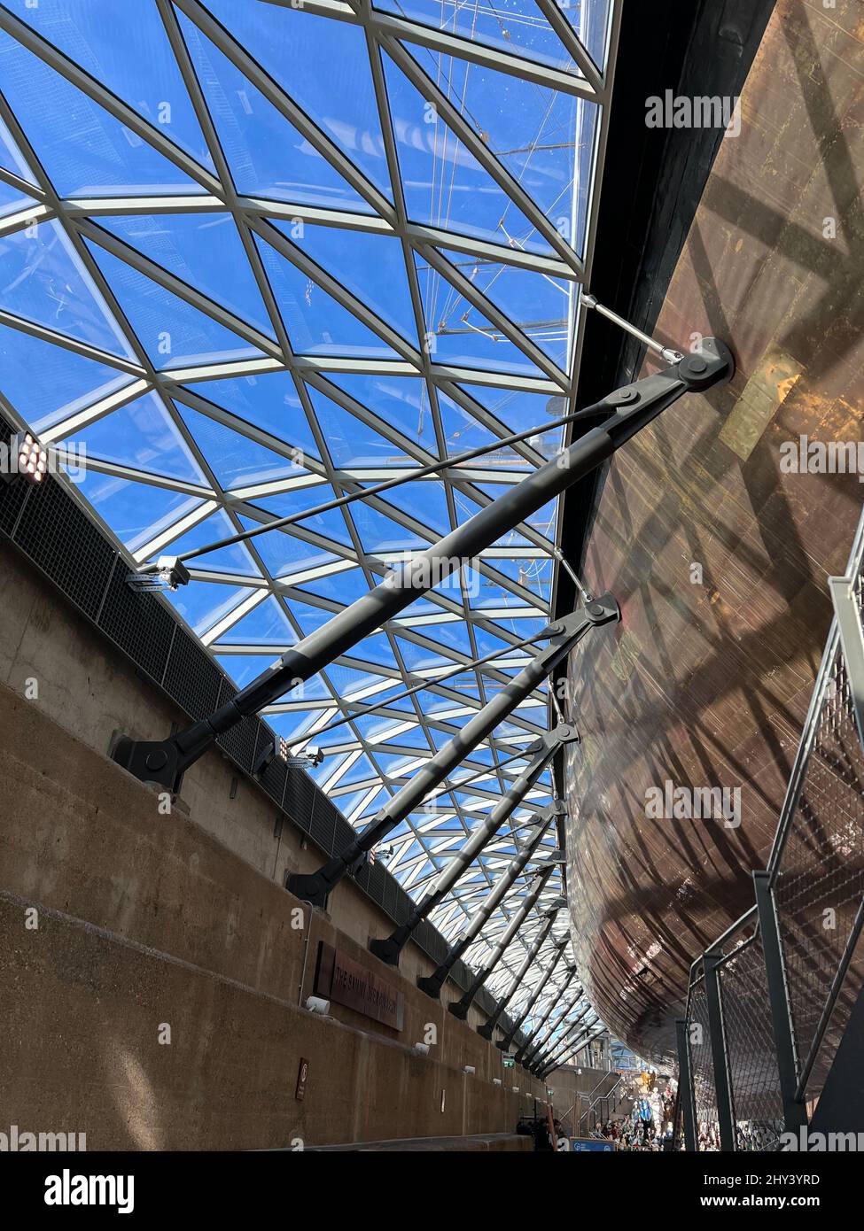 A glass roof and some iron trusses Stock Photo - Alamy