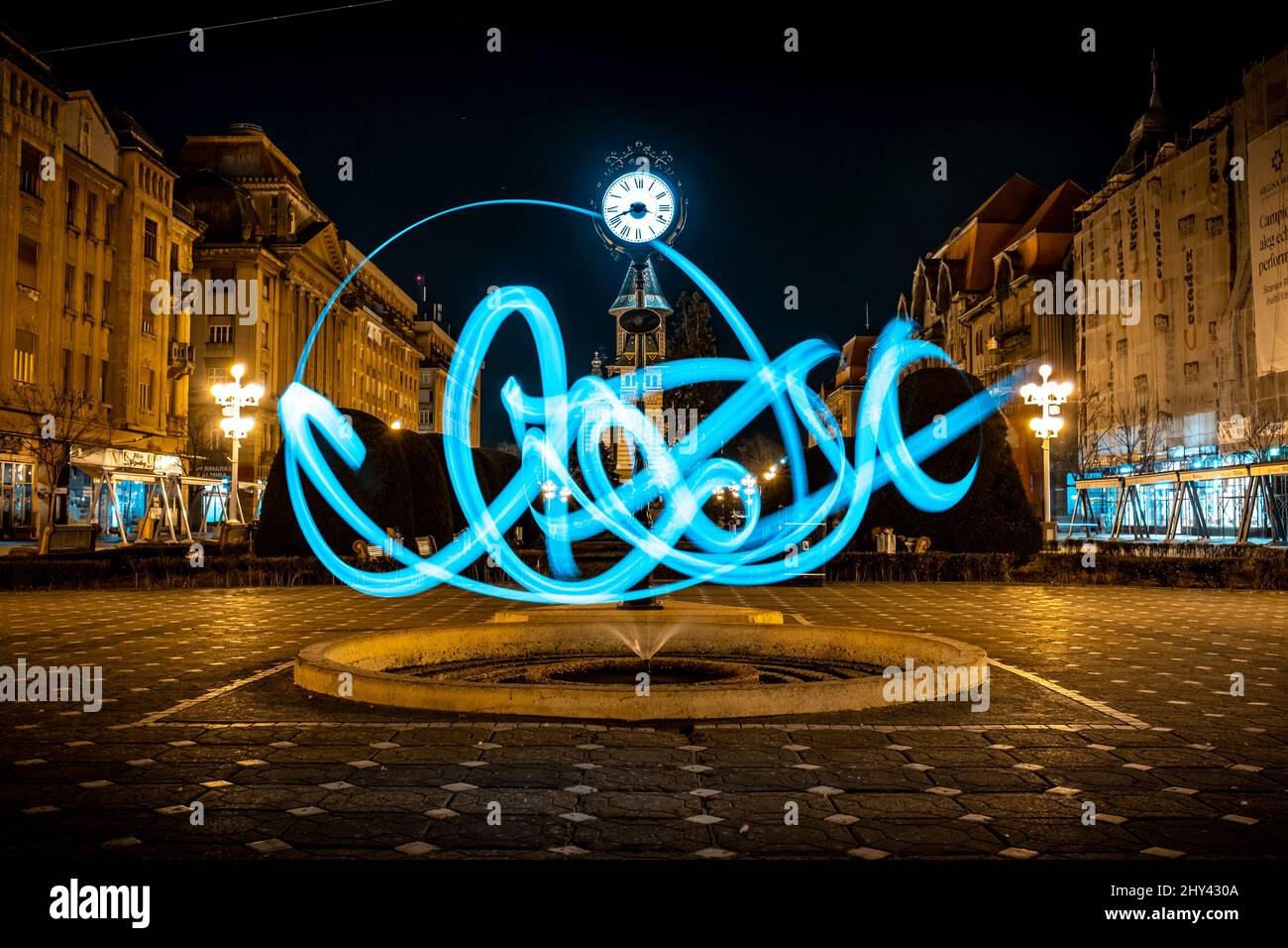 Abstract monument with blue neon lights in Timisoara at night Stock ...