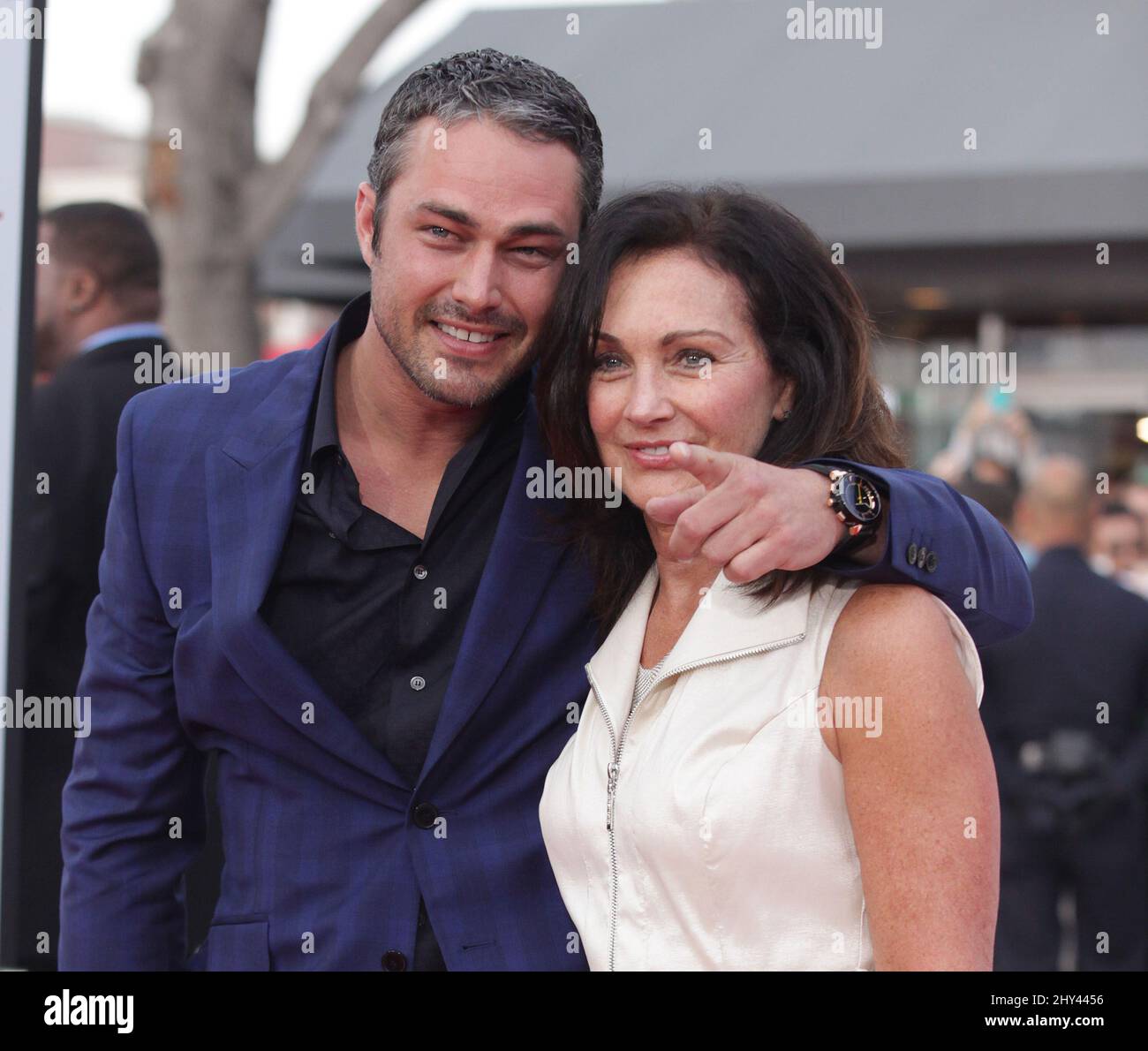 Taylor Kinney & Pam Kinney arriving for the premiere of The Other Woman ...