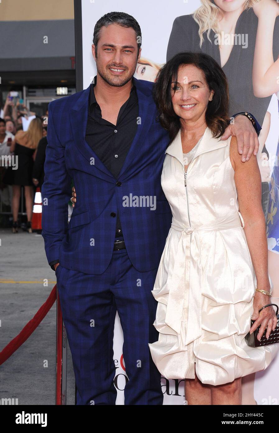 Taylor Kinney & Pam Kinney arriving for the premiere of The Other Woman ...