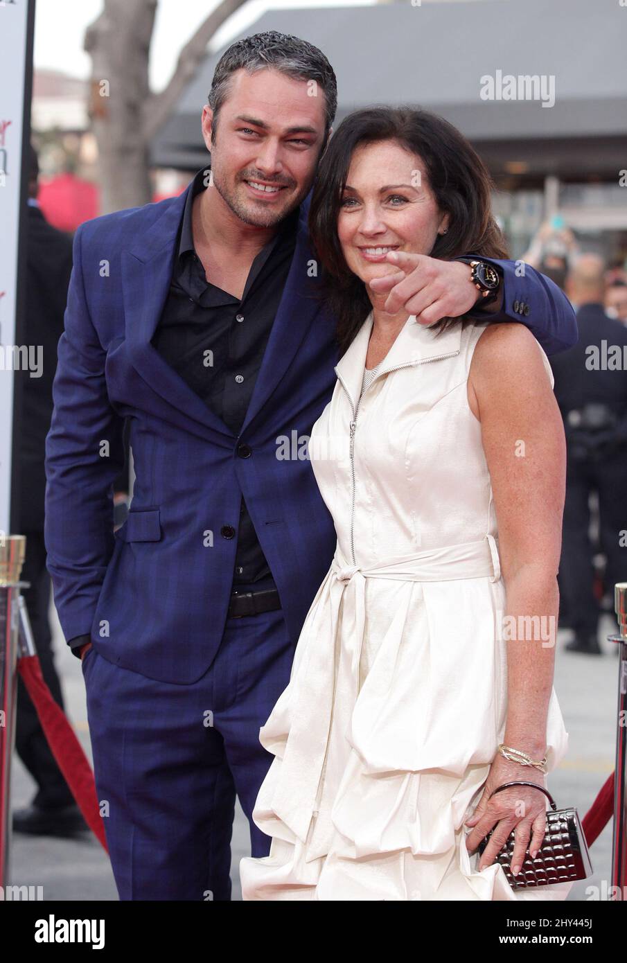 Taylor Kinney & Pam Kinney arriving for the premiere of The Other Woman ...