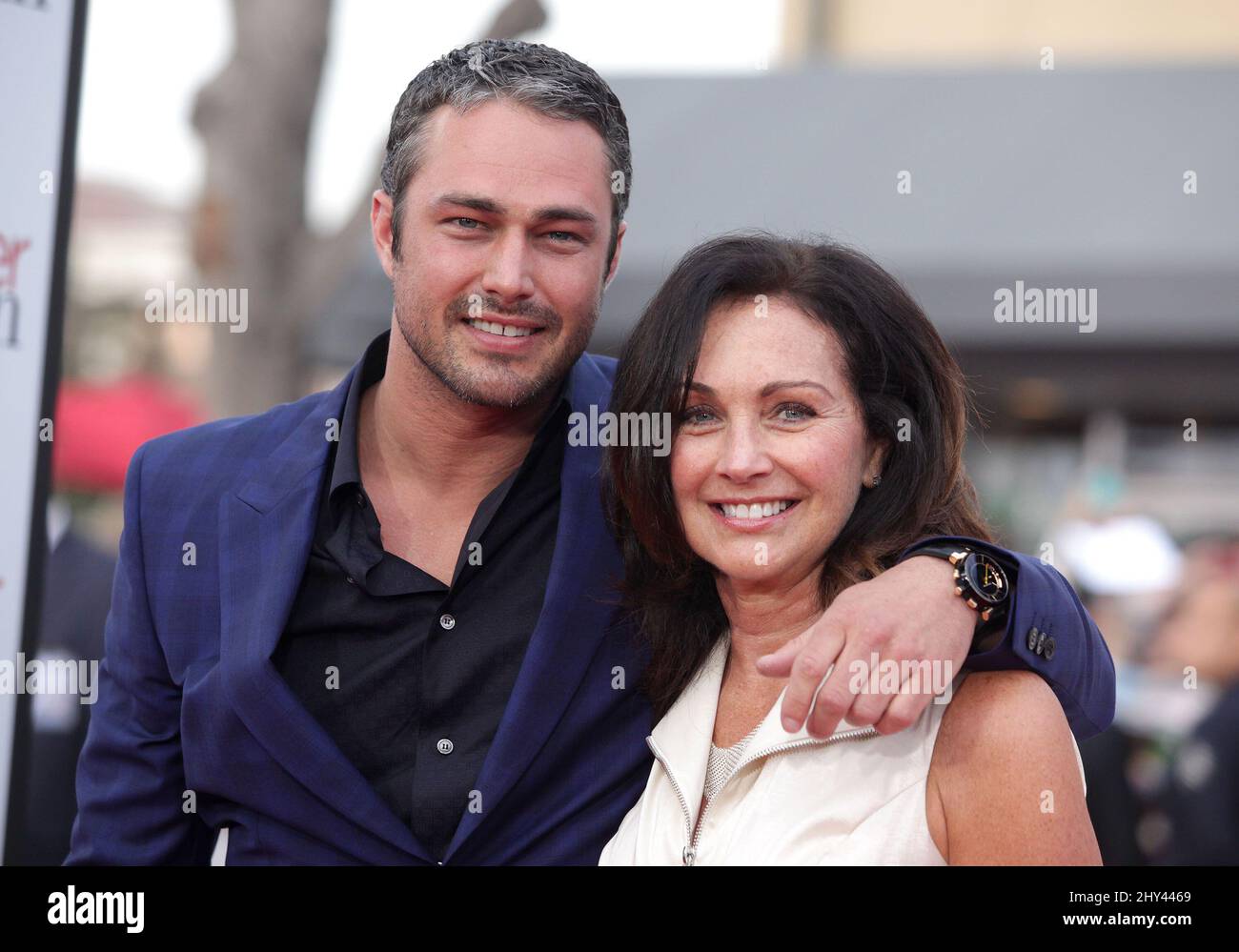 Taylor Kinney & Pam Kinney arriving for the premiere of The Other Woman ...