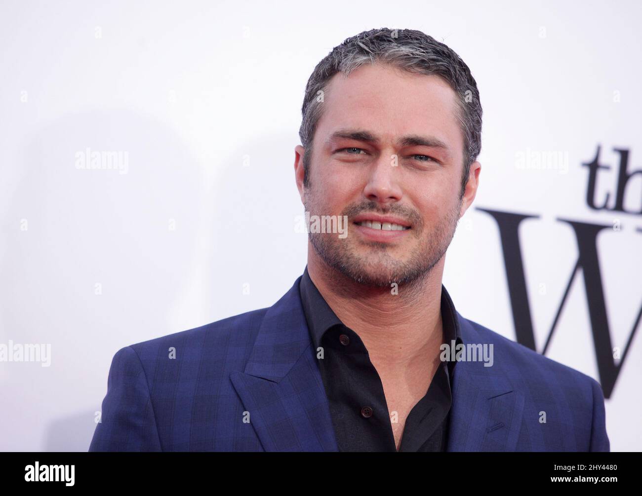 Taylor Kinney arriving for the premiere of The Other Woman held at the ...