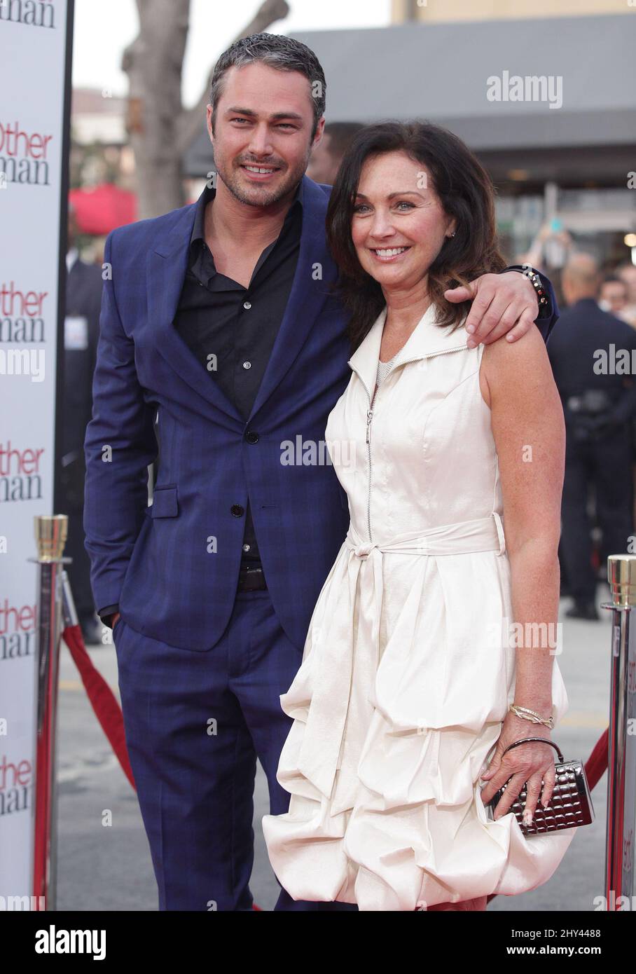 Taylor Kinney & Pam Kinney arriving for the premiere of The Other Woman ...