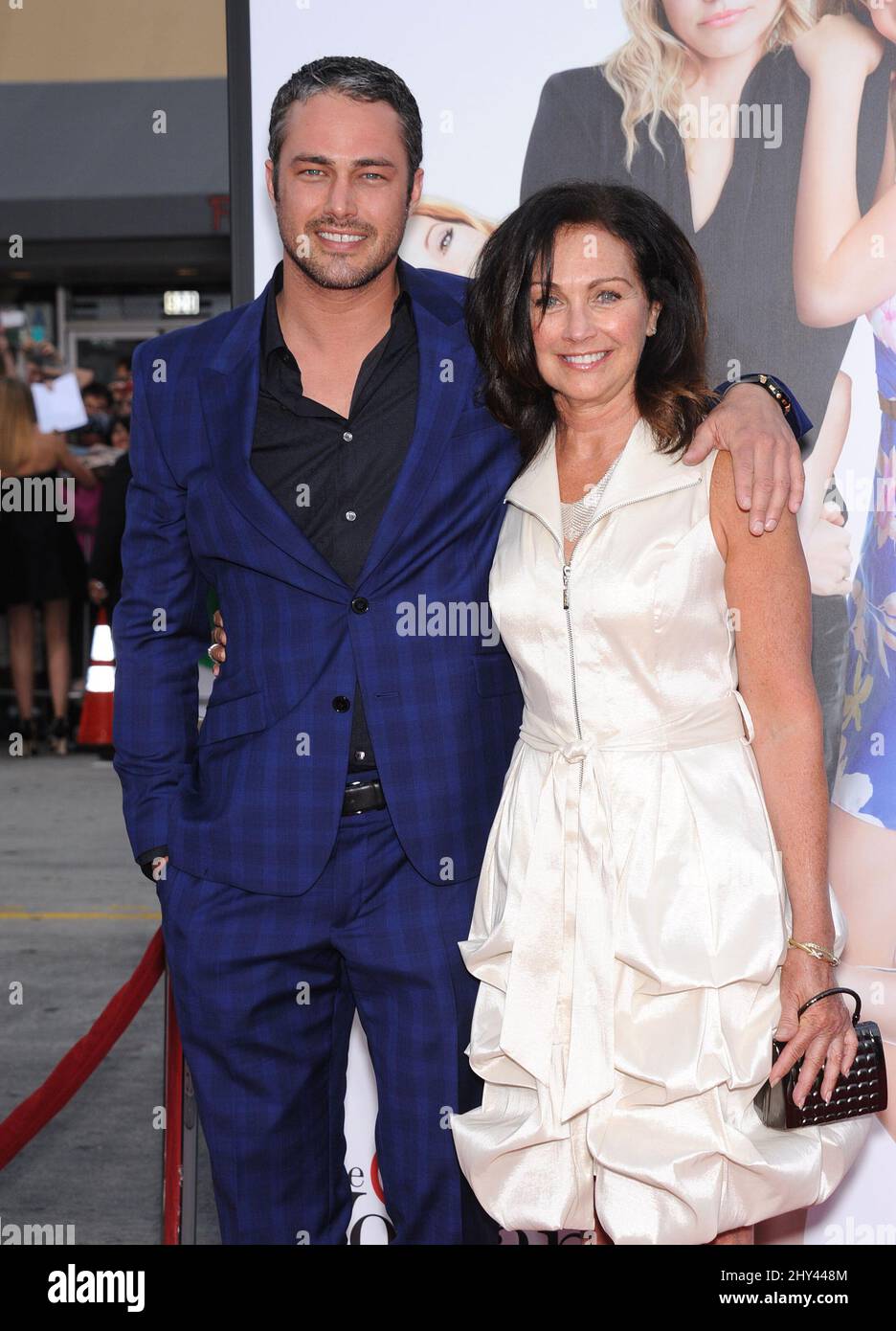 Taylor Kinney & Pam Kinney arriving for the premiere of The Other Woman ...