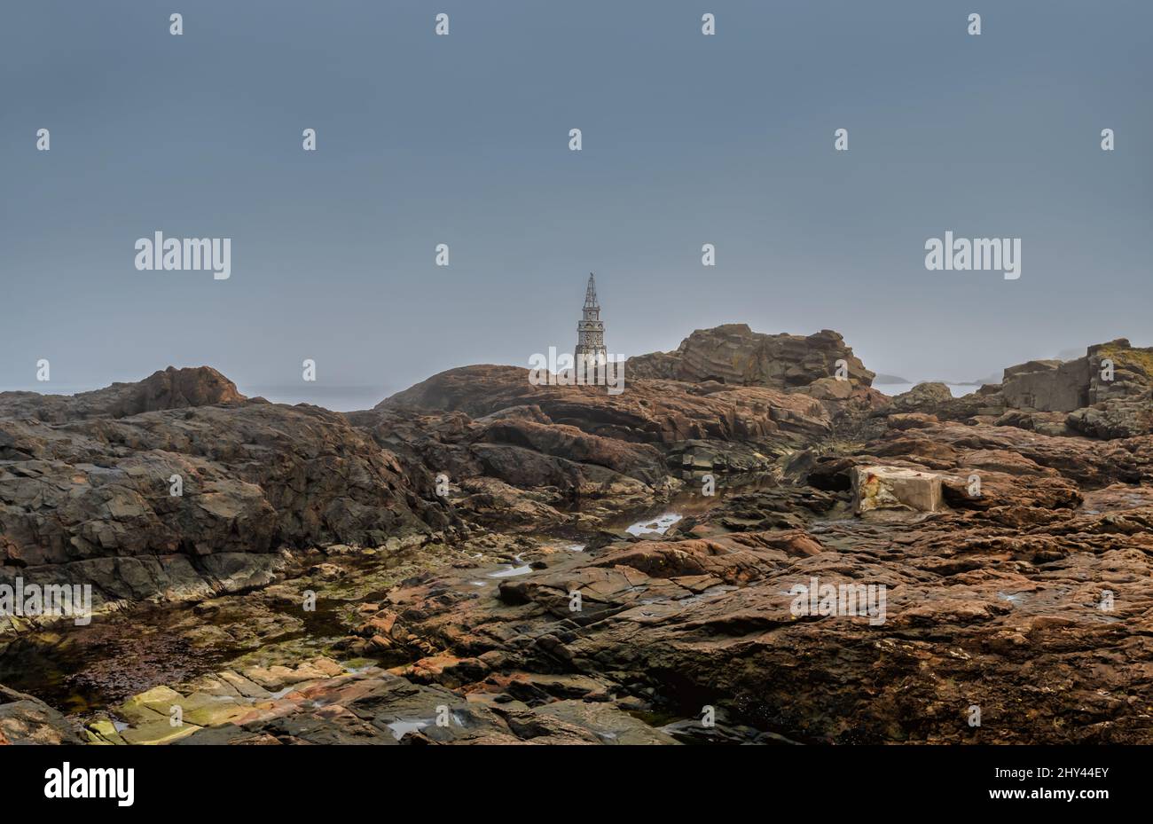 Distant view of an old lighthouse of Ahtopol on a foggy day Stock Photo ...