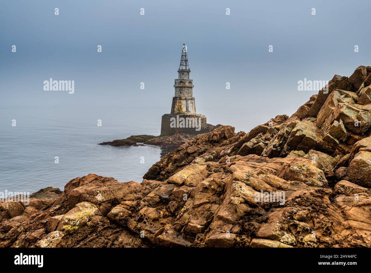 Old lighthouse of Ahtopol in Bulgaria against a blue cloudless sky ...