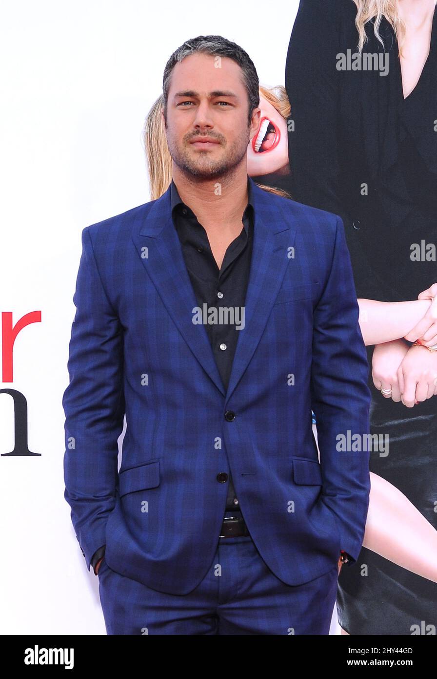 Taylor Kinney arriving for the premiere of The Other Woman held at the ...
