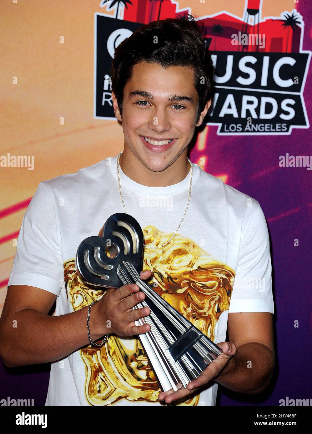 Austin Mahone With His Award In The Press Room At The 2014 Iheart Radio