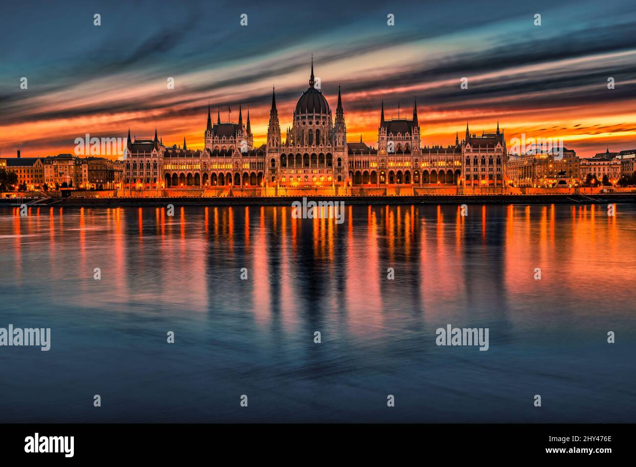 View of the Hungarian Parliament Building at magical sunset in Budapest ...