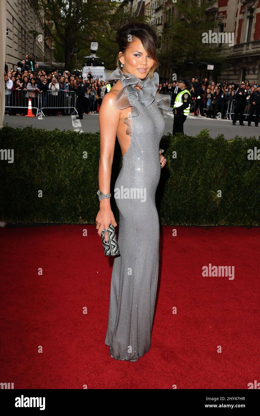 Christine Teigen arriving at the Costume Institute Benefit Met Gala ...