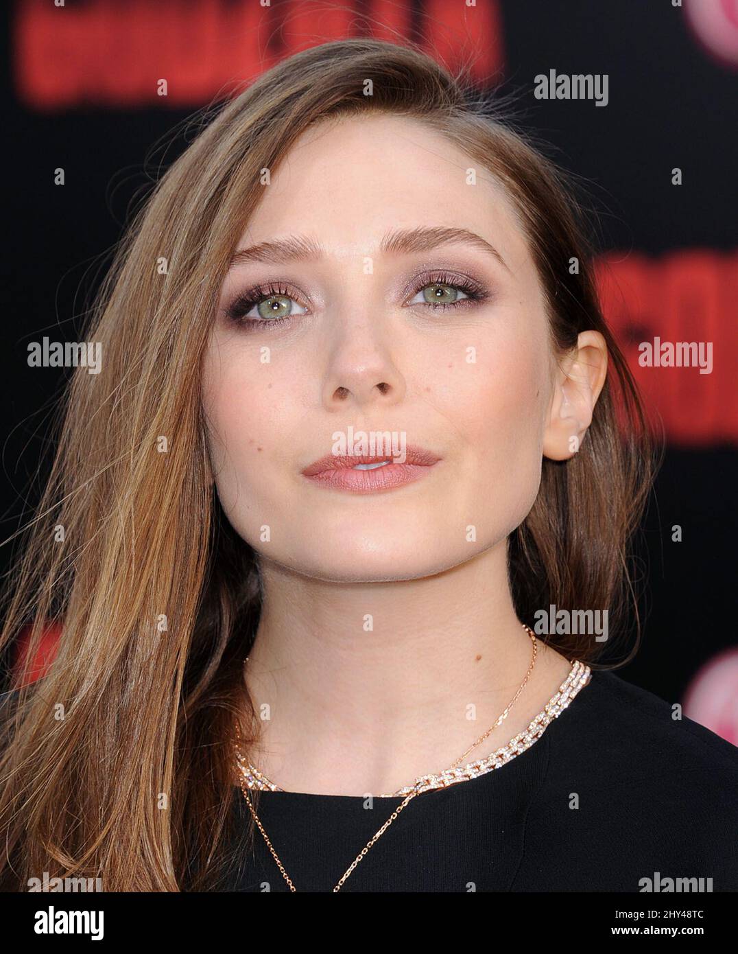 Elizabeth Olsen attending the premiere of Godzilla in Los Angeles ...