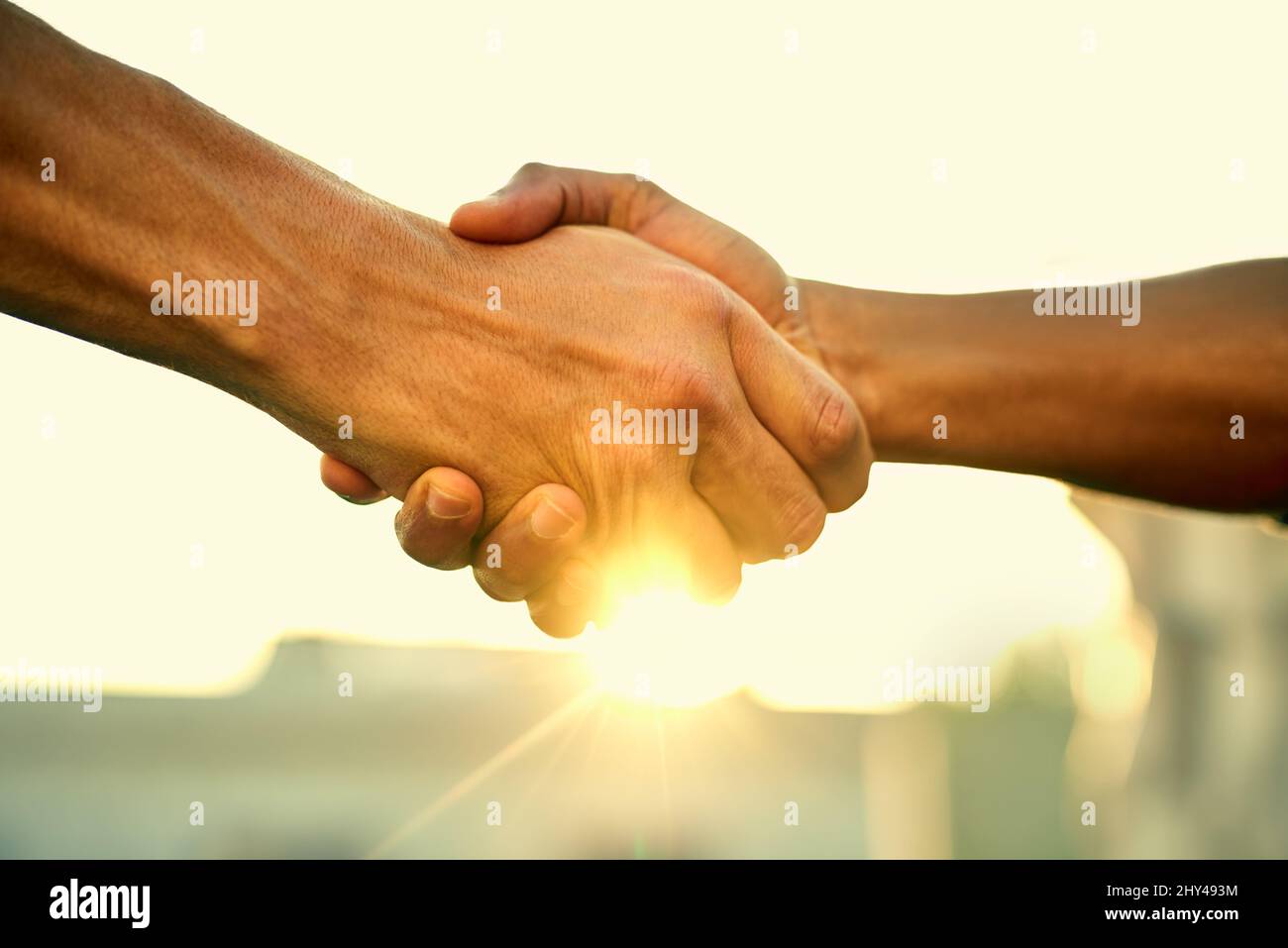 Come together, do great things. Cropped shot of two people shaking ...