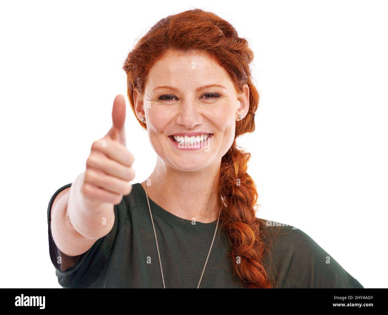Giving the go-ahead. Cropped shot of a beautiful young woman showing ...