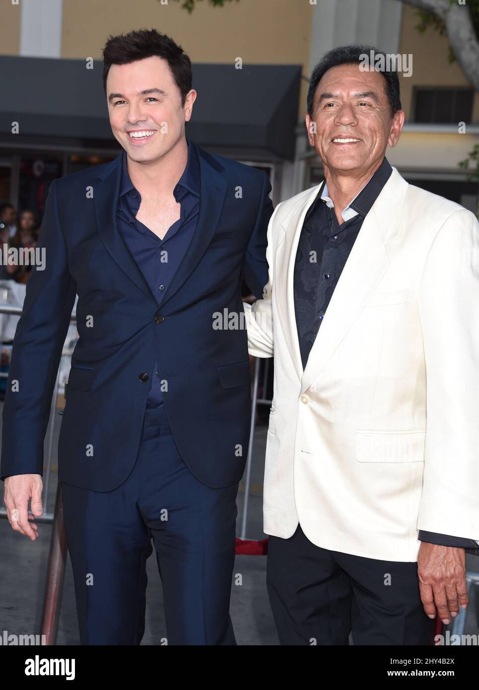 Seth MacFarlane and Wes Studi arriving at the premiere of A Million ...