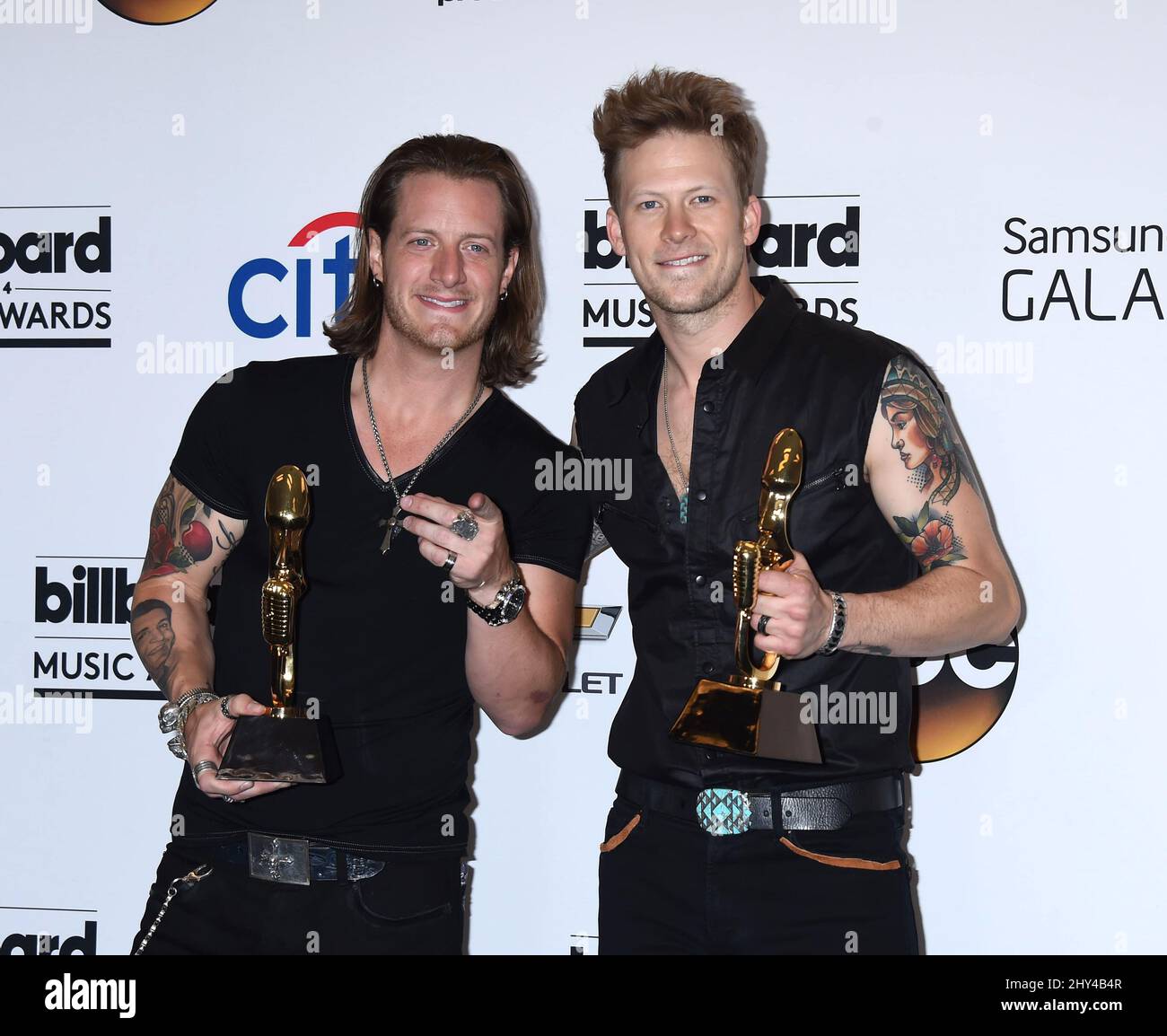 Florida Georgia Line with the award for top country song for "Cruise ...
