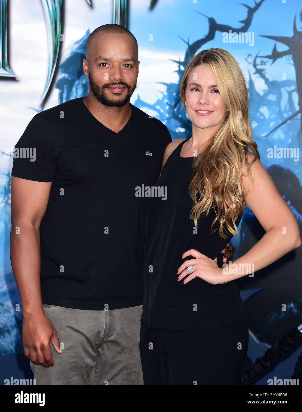 Donald Faison and Cacee Cobb attending the "Maleficent" premiere held ...