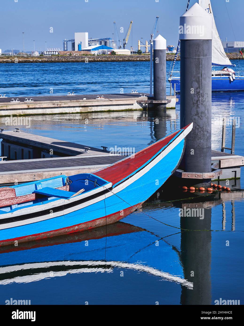 Moliceiro boat in Ria de Aveiro and its reflection in water Stock Photo ...
