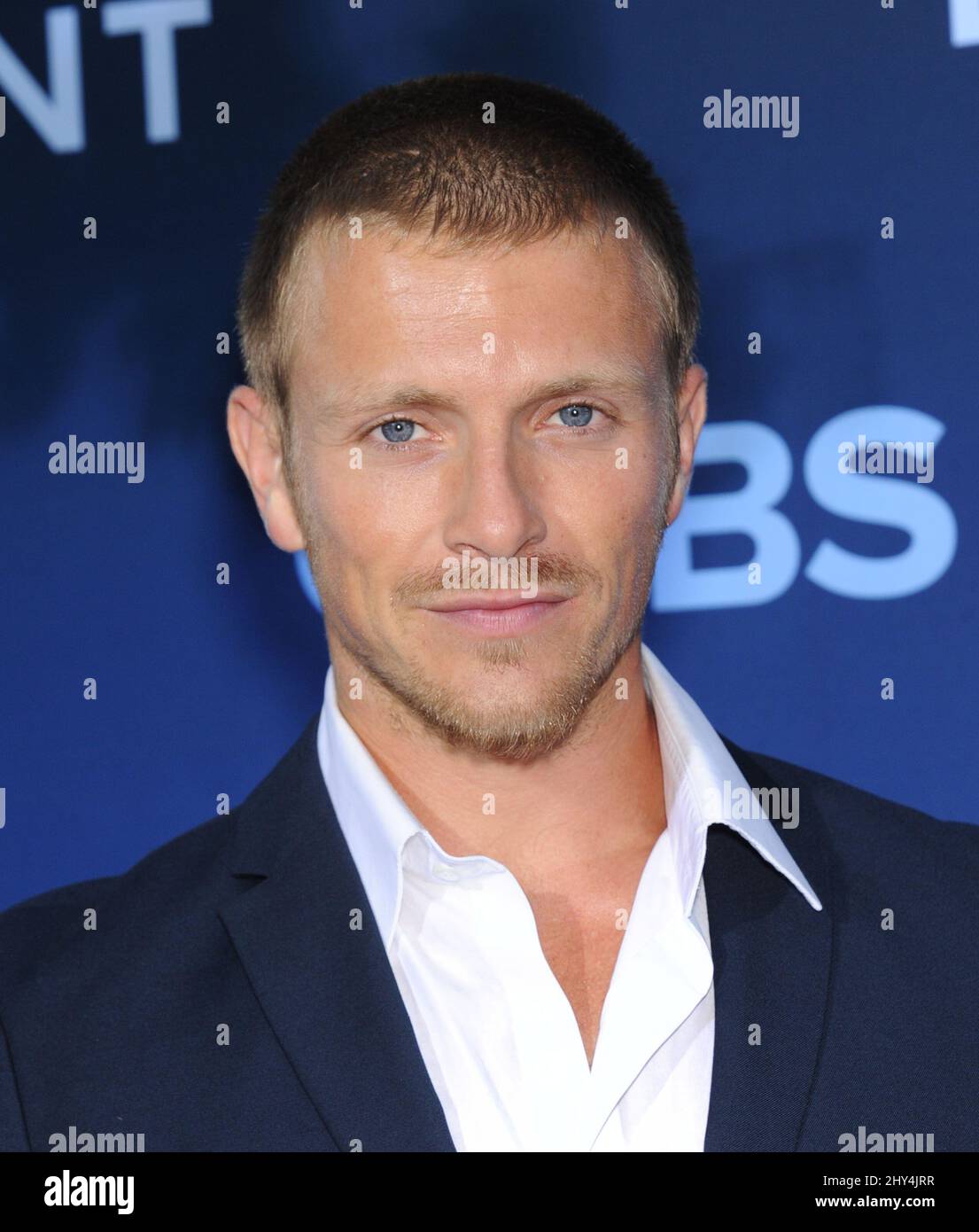 Charlie Bewley attending the premiere of "Extant" in Los Angeles ...