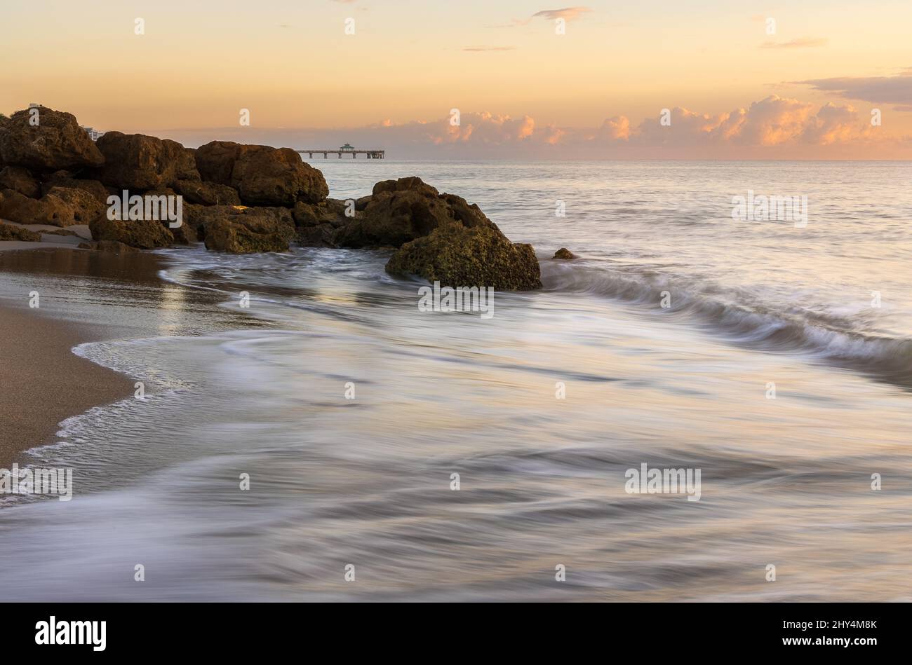 Beautiful view of a beach near the gray water sea in Deerfield Beach ...