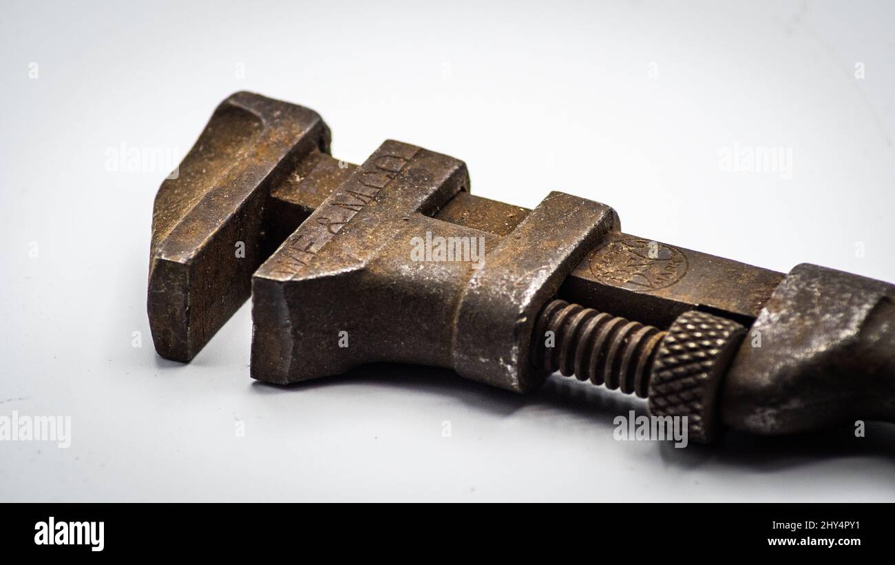 Old rusty wrench isolated on a white background Stock Photo - Alamy