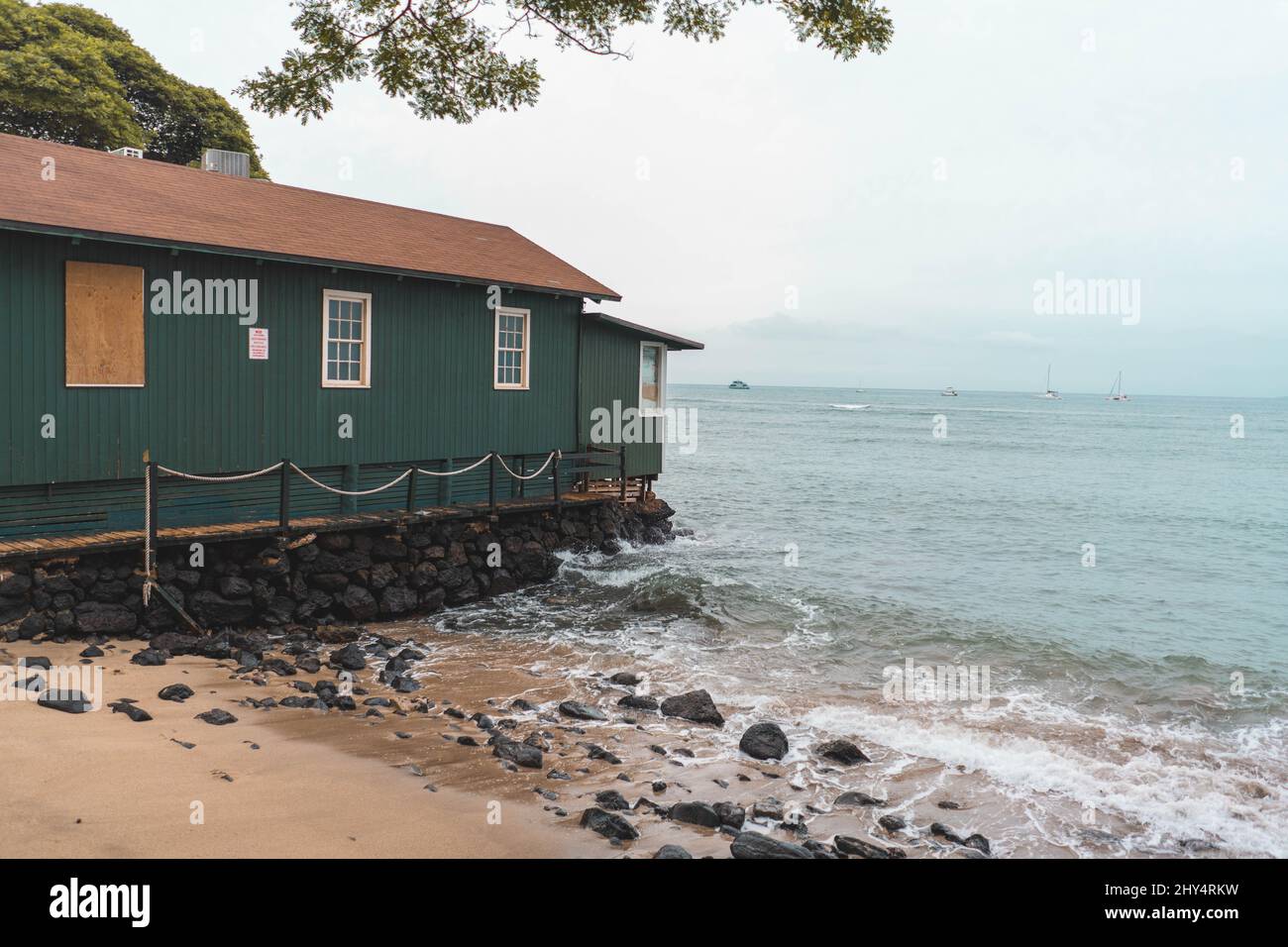 Beautiful scene of a Tropical Beach Hut House Shore Blue Ocean Waves ...