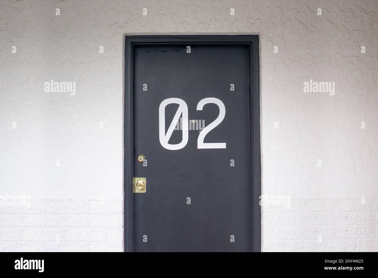 Grayscale of a Modern Black Hotel Motel Door With A Large White Room ...