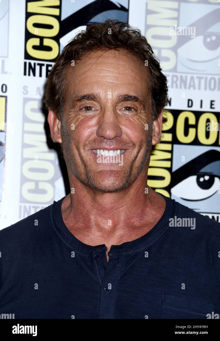 John Wesley Shipp attending the CW's "The Flash" photo call at Comic ...