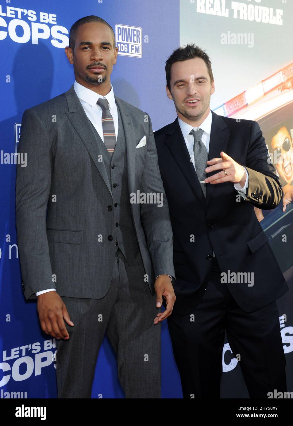 Damon Wayans Jr & Jake Johnson attending the "Let's Be Cops" premiere ...