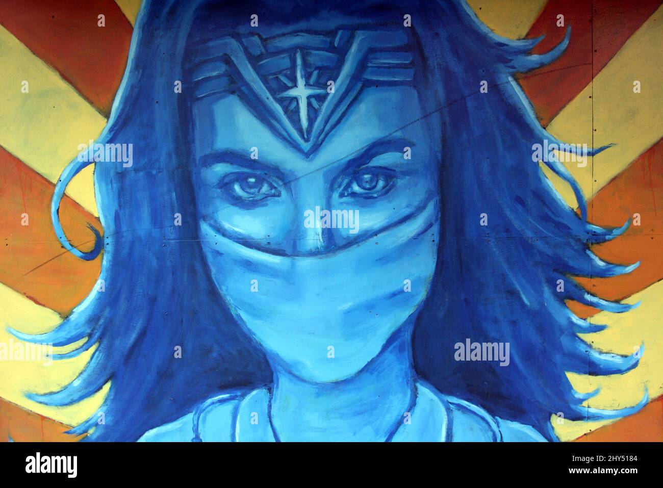 Mural of a female comic hero in medical mask. Vancouver, British ...