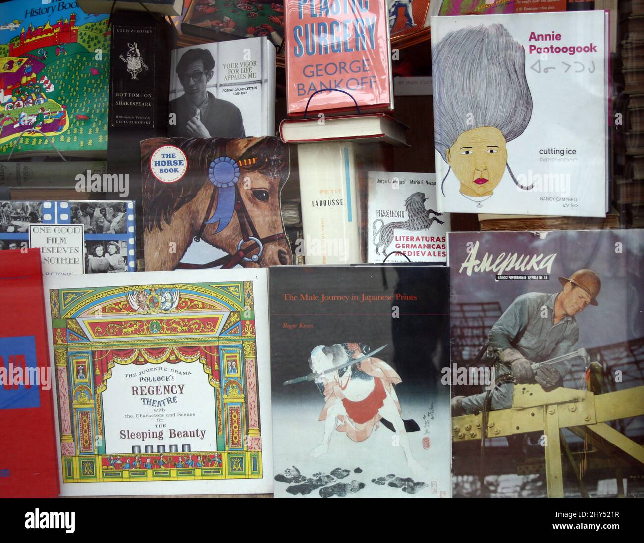 Old book in storefront window in downtown Vancouver, British Columbia ...