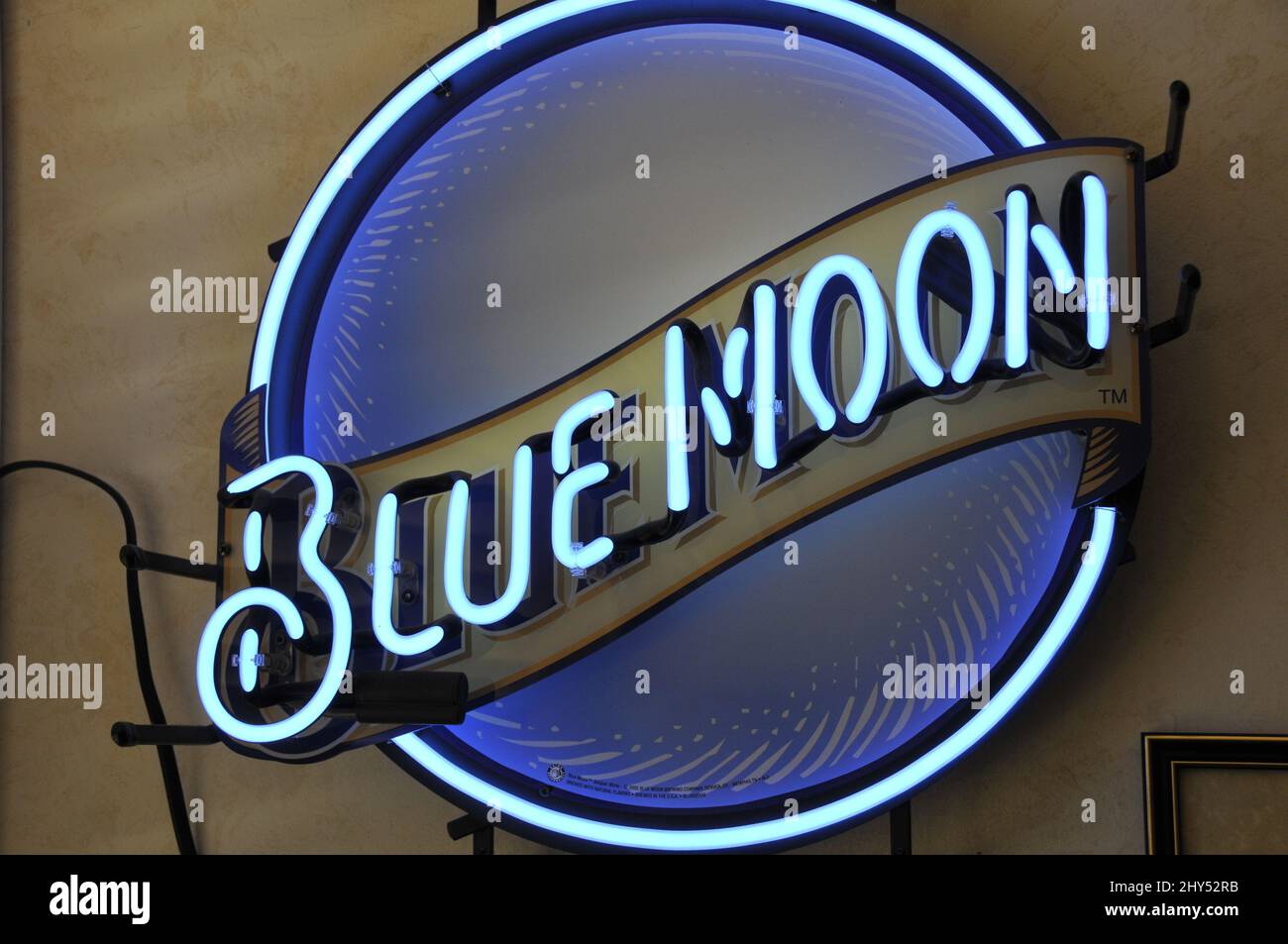Blue Moon brand beer neon sign hanging on the wall at a pub in Missouri ...
