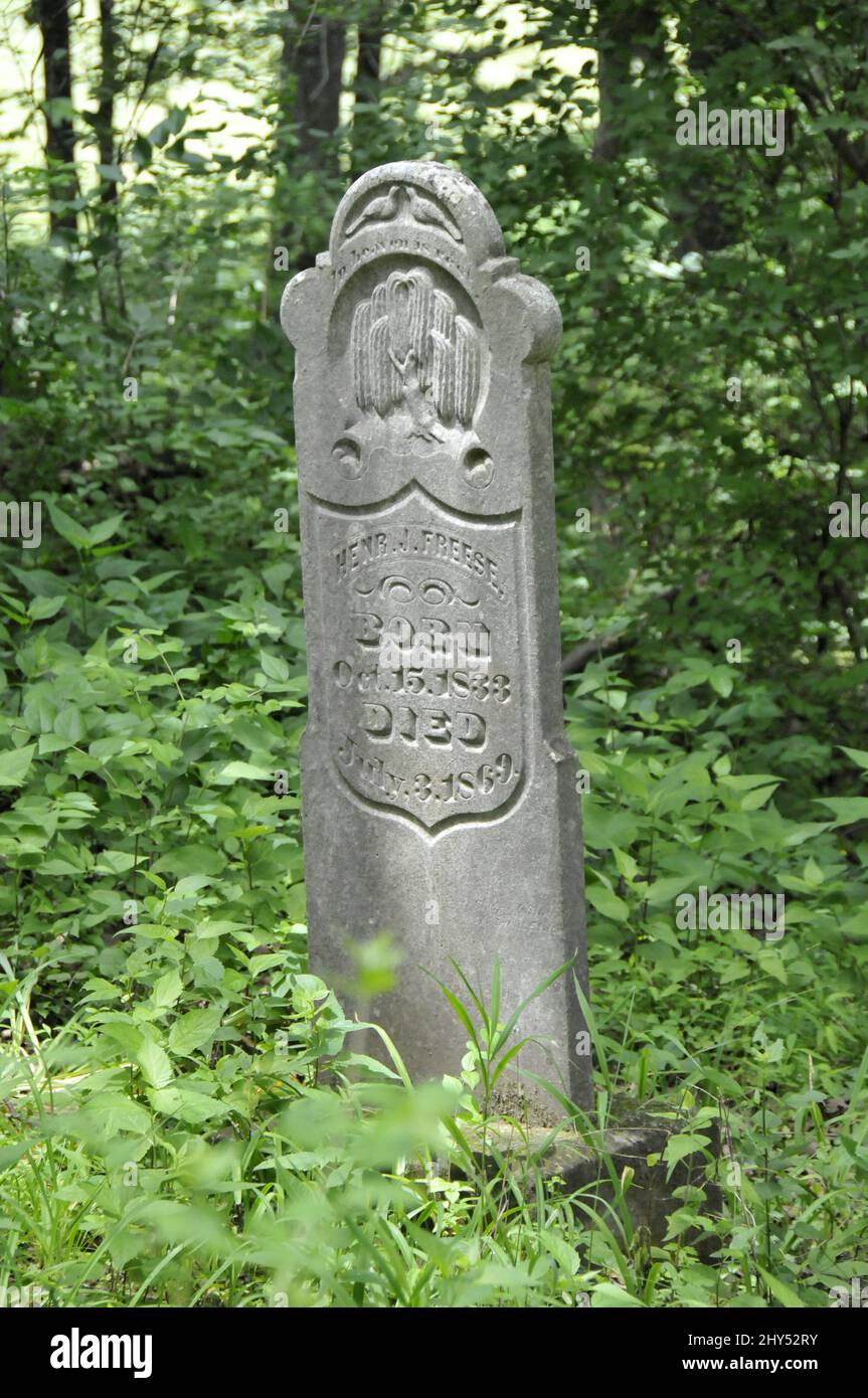 Very old headstone in an overgrown cemetery in Missouri Stock Photo - Alamy