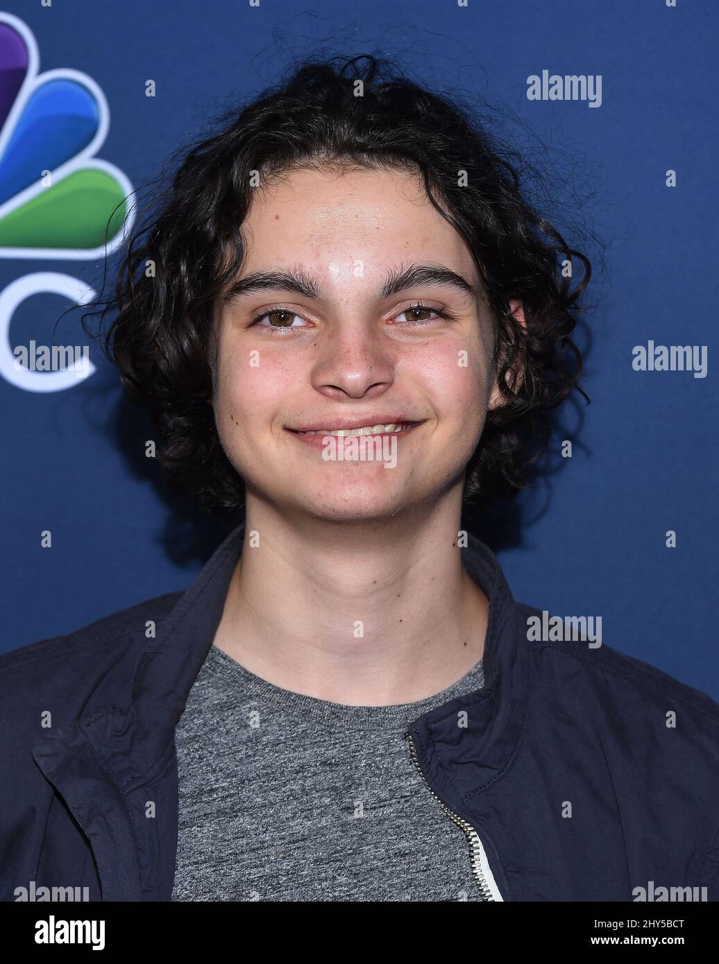 Max Burkholder attending the NBC Vanity Fair 2014-2015 TV Season Red ...