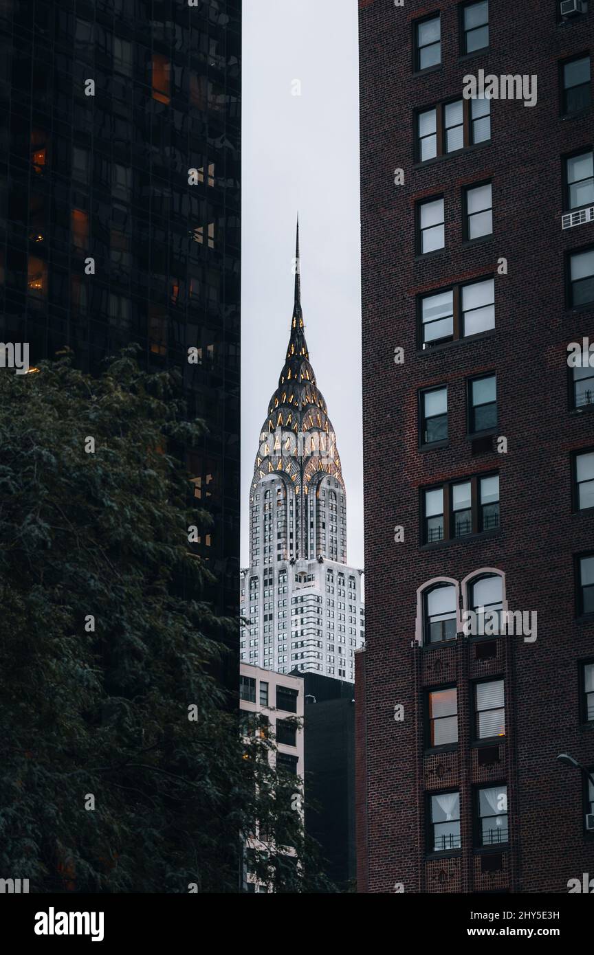 Shot of Empire State building between two buildings Stock Photo - Alamy