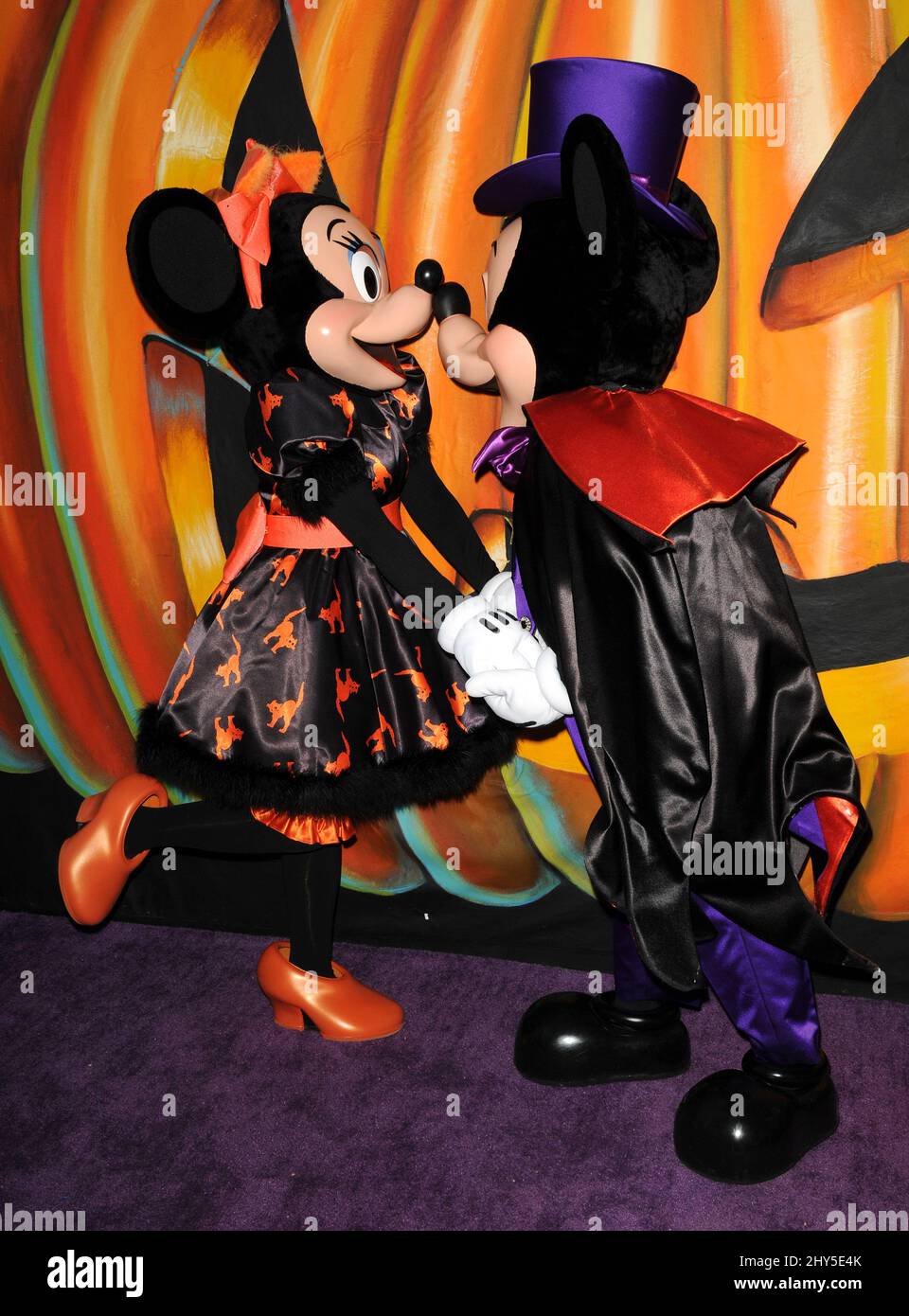 Minnie Mouse and Mickey Mouse attending Disney's VIP Halloween event ...