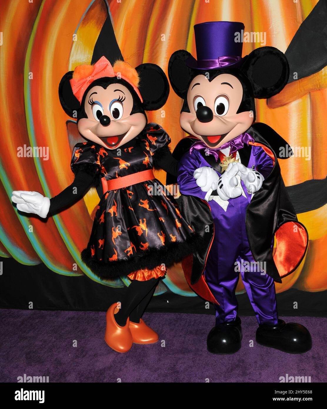 Minnie Mouse and Mickey Mouse attending Disney's VIP Halloween event ...