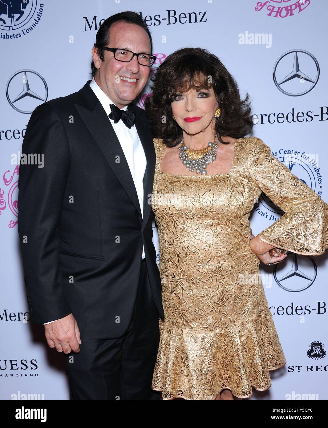 Joan Collins & Percy Gibson arriving for the Carousel Of Hope Ball held ...