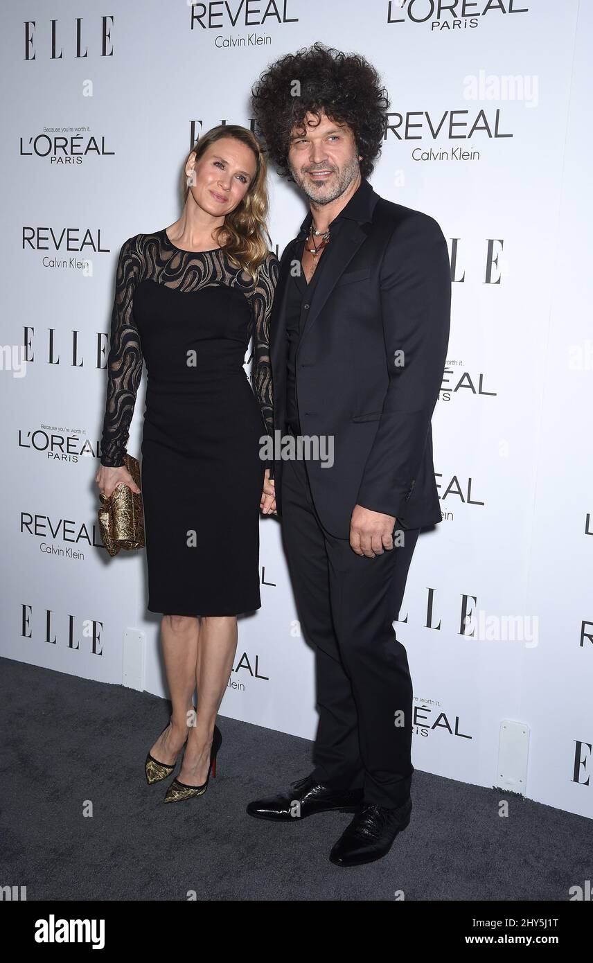 Renee Zellweger and Doyle Bramhall attending the 2014 ELLE Women in ...