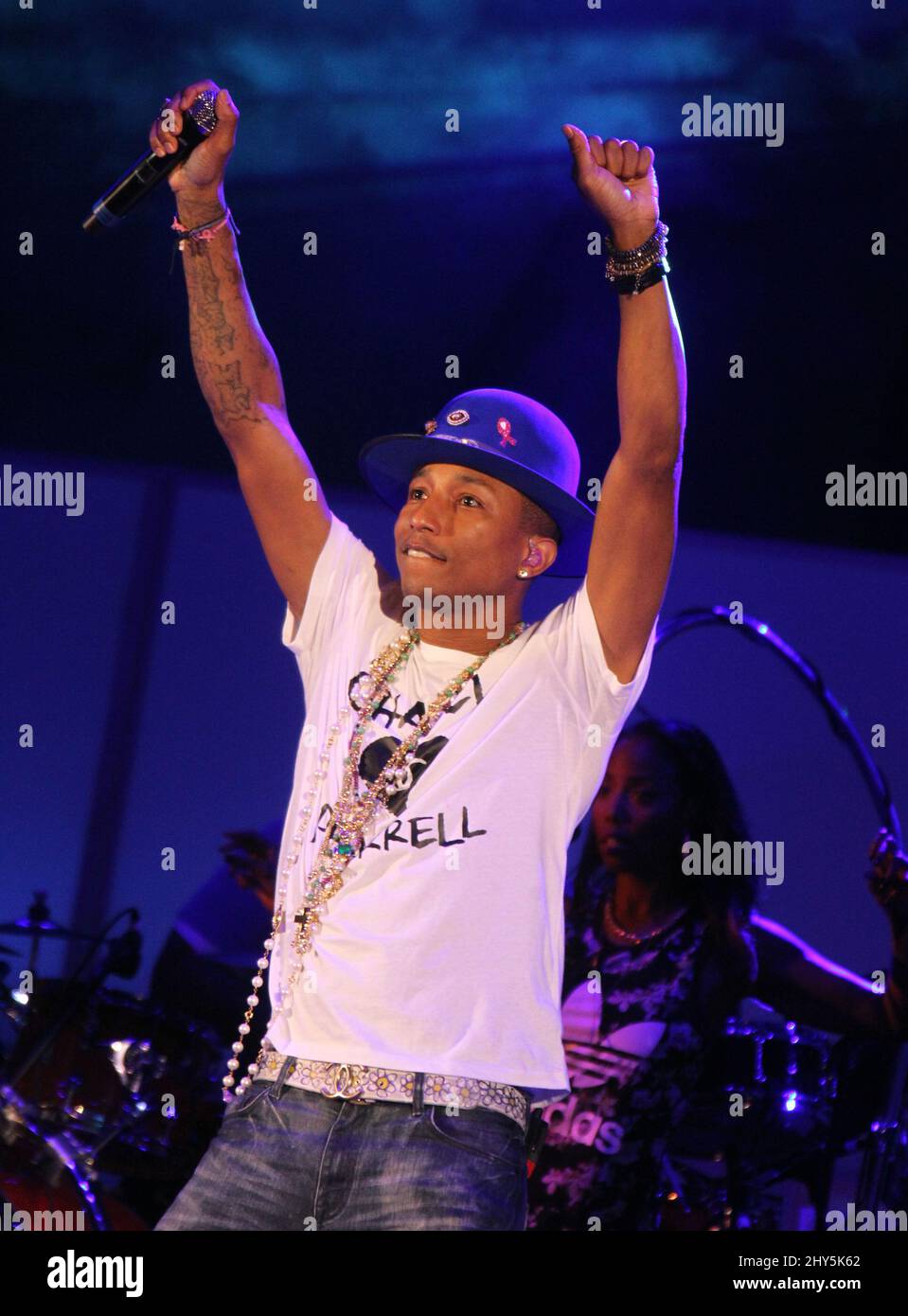 Pharrell Williams performing at the "We Can Survive" benefit concert ...