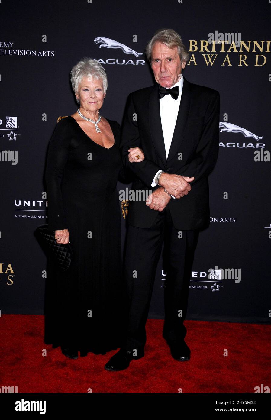 Judi Dench and David Mills attending the BAFTA Jaguar Brittannia Awards ...
