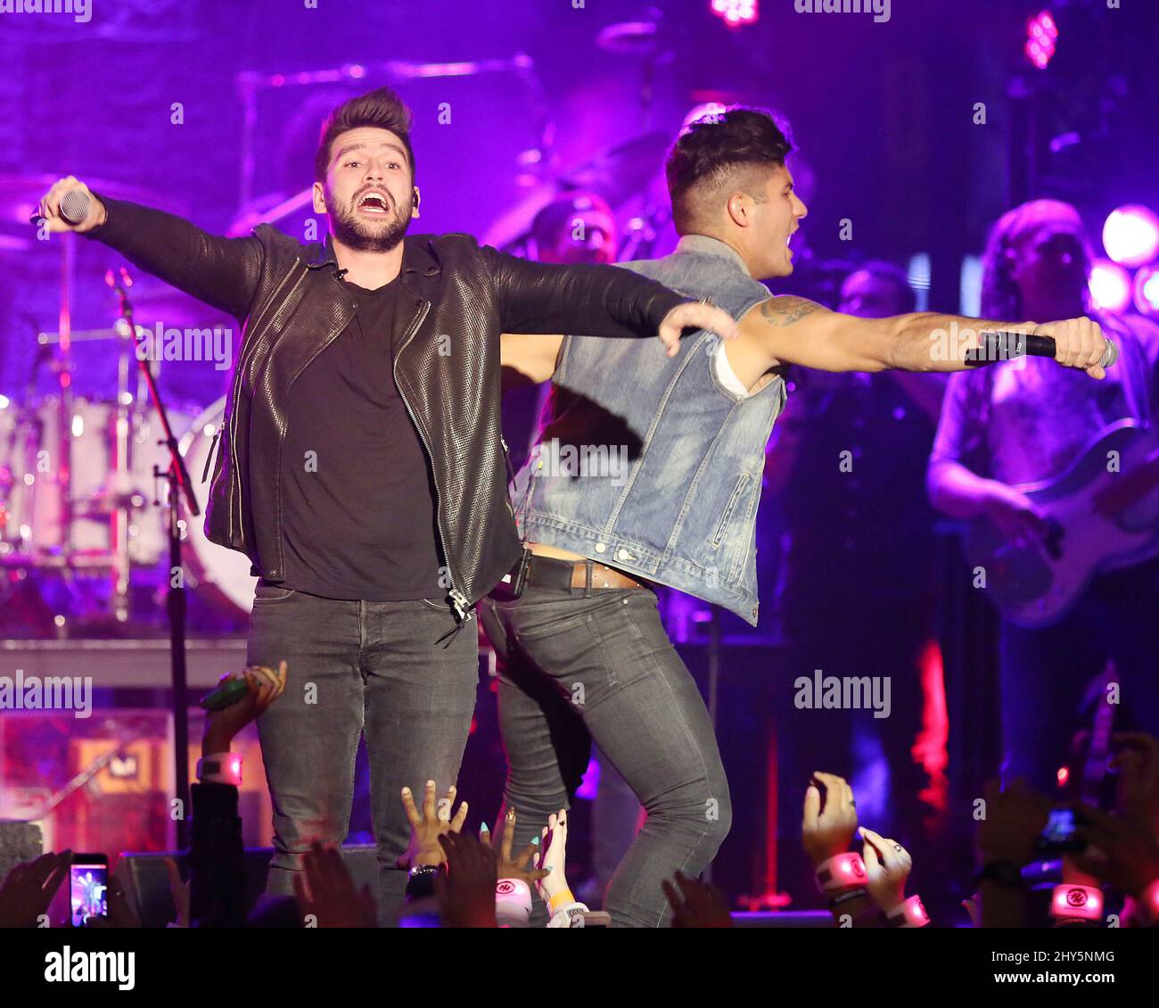 Dan + Shay attending the USO Moments Street Party at the bridgestone ...
