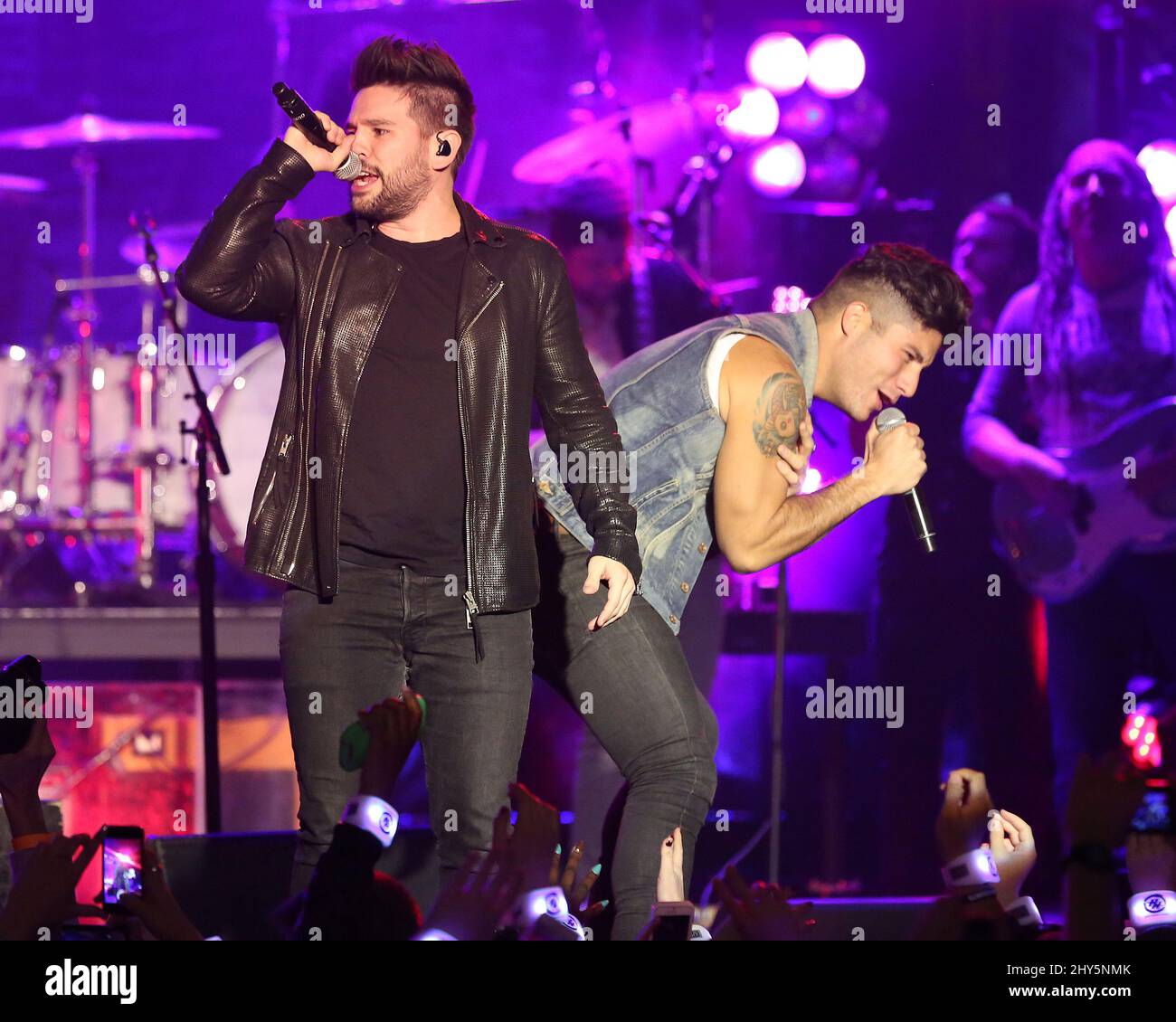 Dan + Shay attending the USO Moments Street Party at the bridgestone ...