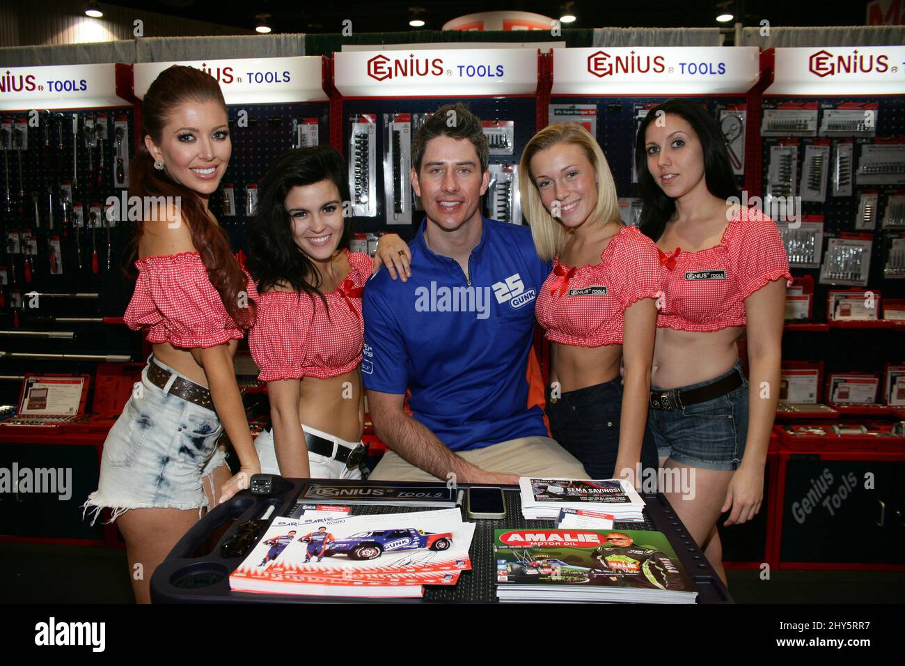 Arie Luyendyk Jr., Genius Tools Models attending The 2014 SEMA Show in ...