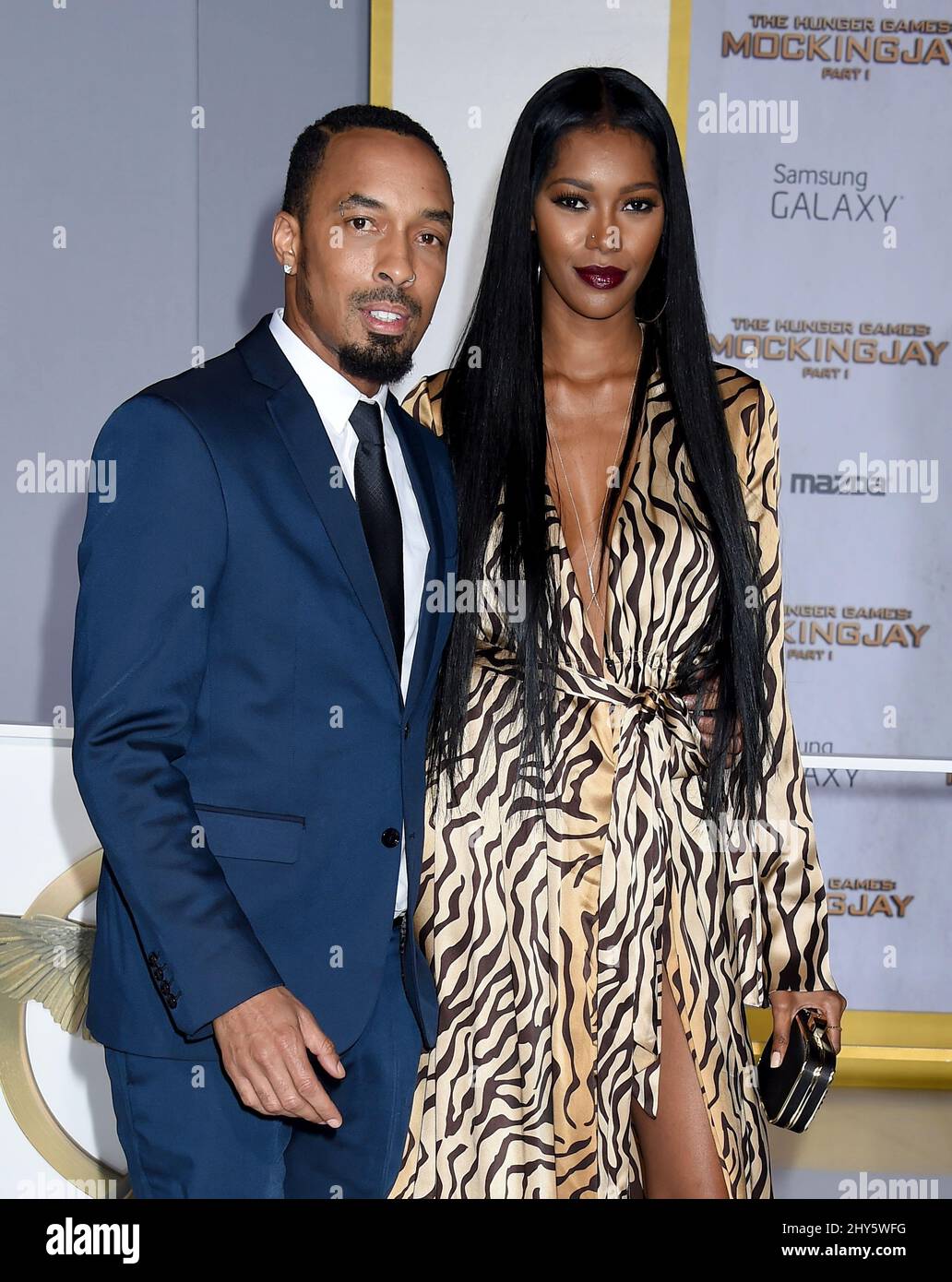 Dallas Austin and Jessica White attending "The Hunger Games: Mockingjay ...